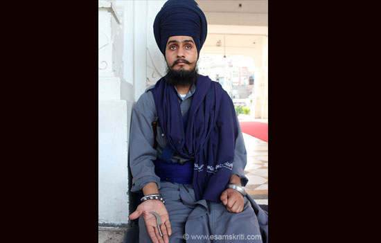 Why do Sikhs wear TURBANS